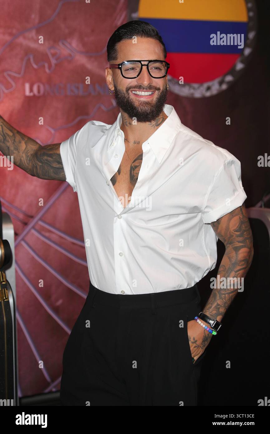 NEW YORK, NEW YORK – OCTOBER 03: Colombian superstar Maluma lights the ...