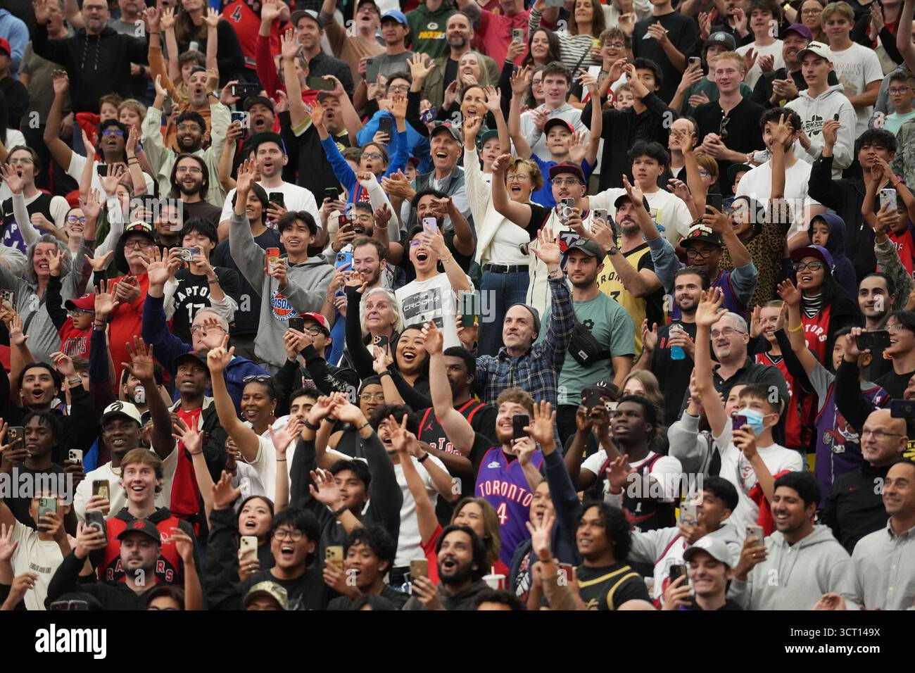 Excited Toronto Raptors fans welcome the players to the floor during ...