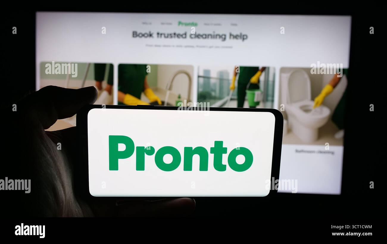In this photo illustration, a person is holding a cellphone with the ...