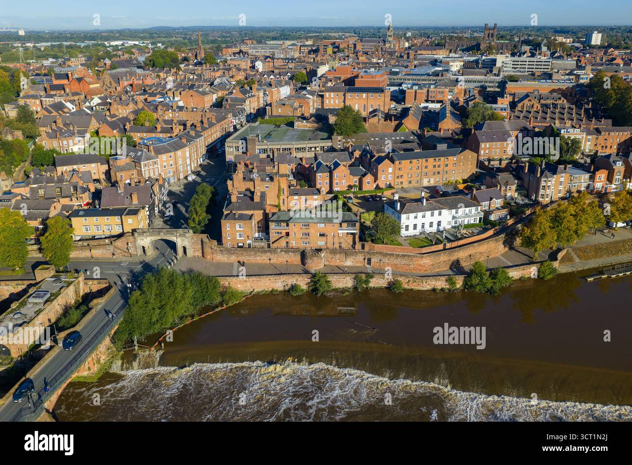 Aerial view of Chester’s city walls with cascading River Dee waters and ...