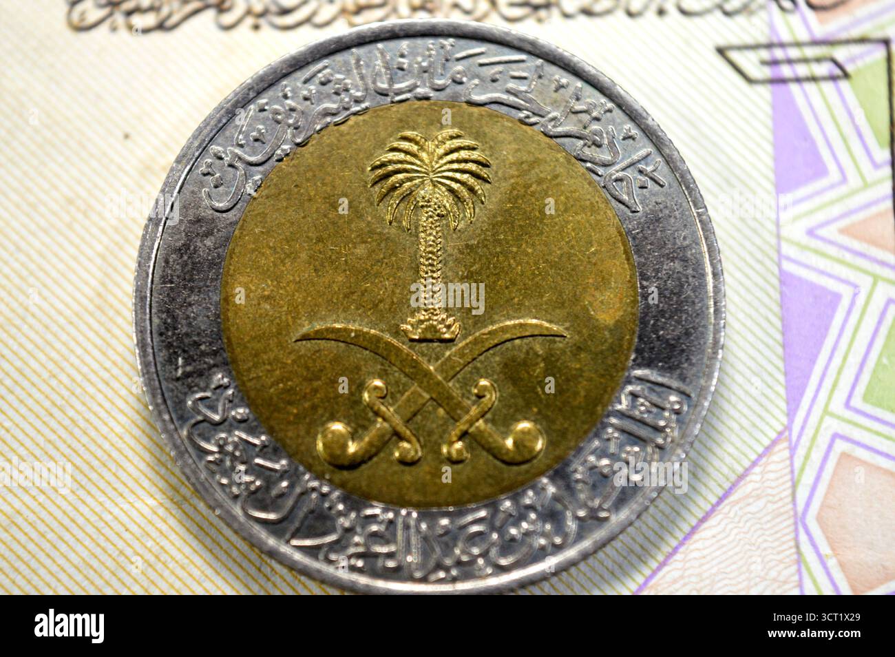The obverse side of 1 SAR one Saudi Arabian Riyal coin features ...
