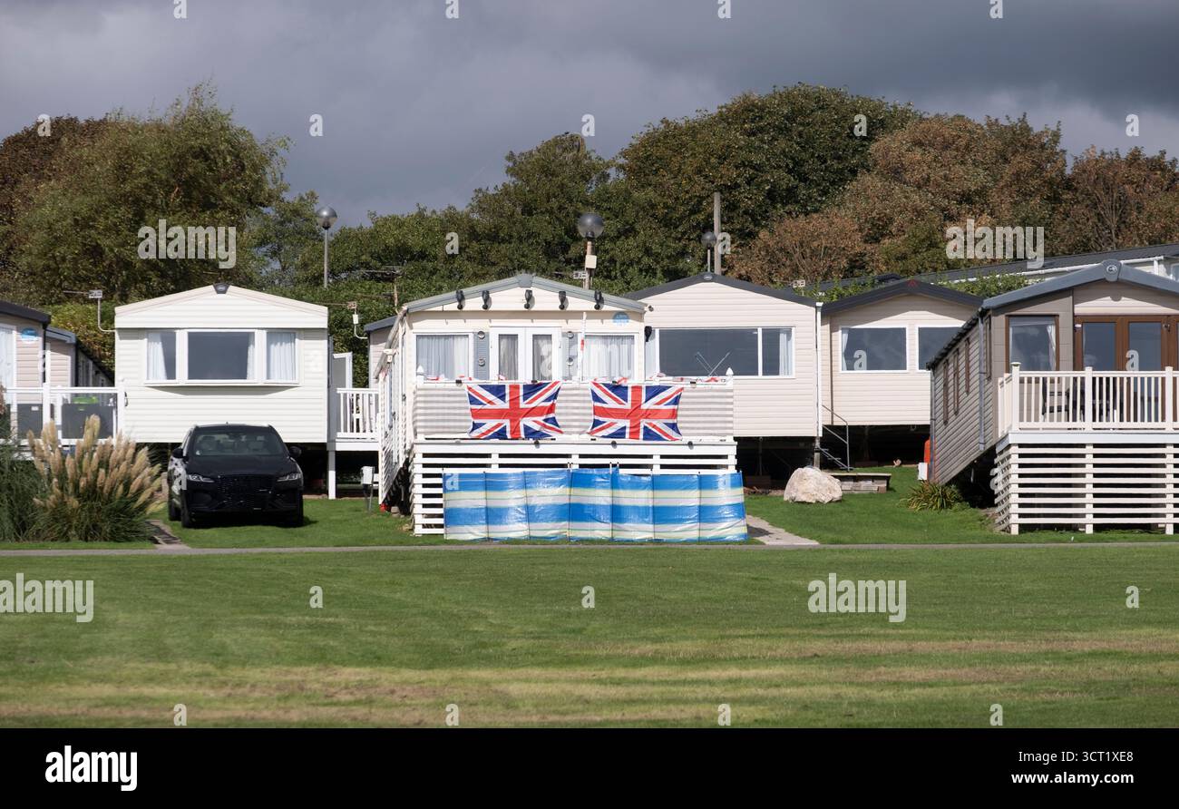 Two Union Jack flags proudly displayed on a residential caravan in ...