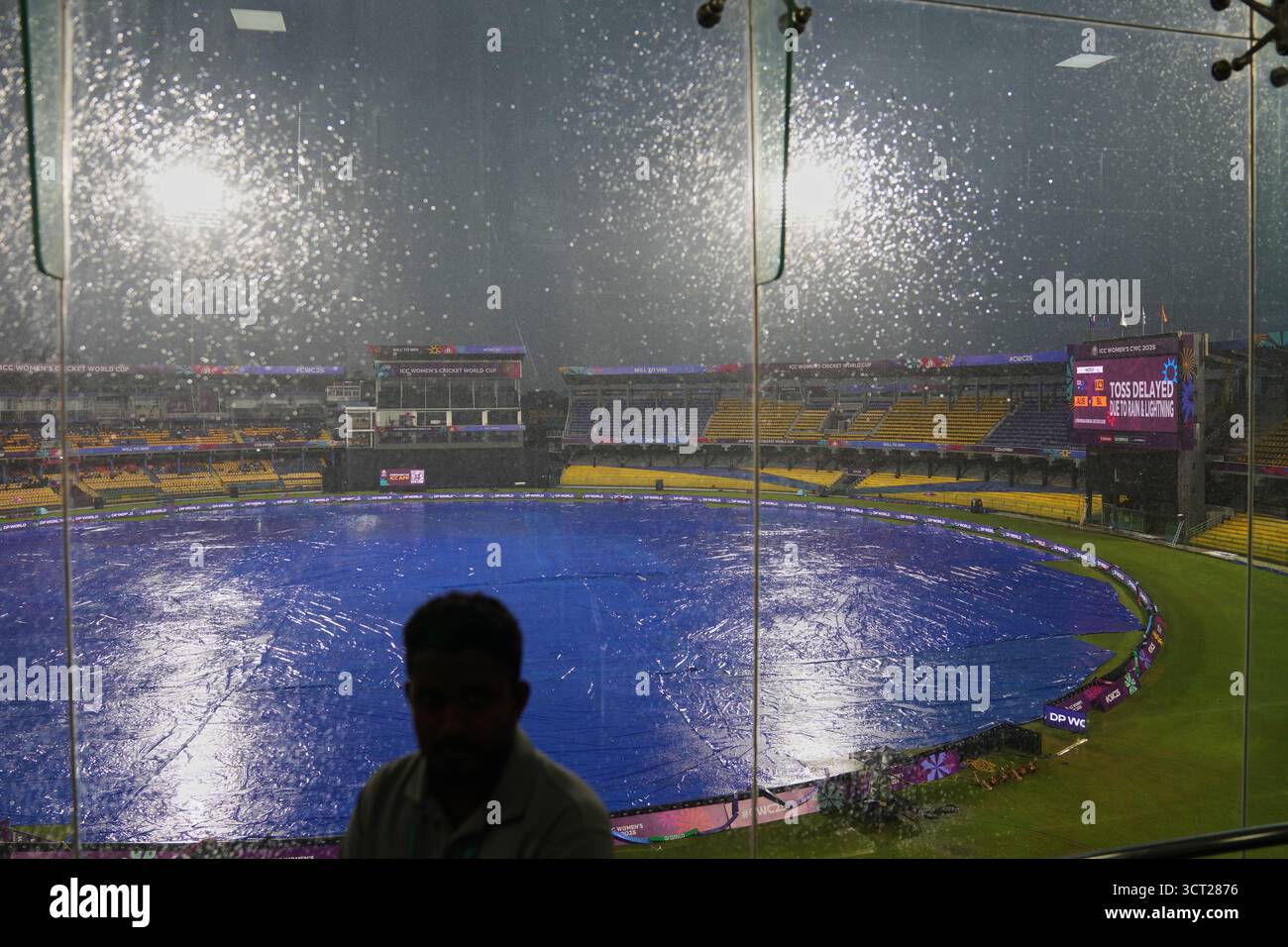 Photo shows the covered field of Premadasa Stadium as rain delays the ...