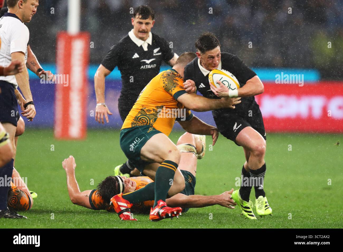 New Zealand's Cam Roigard is tackled by a defender during the Bledisloe ...