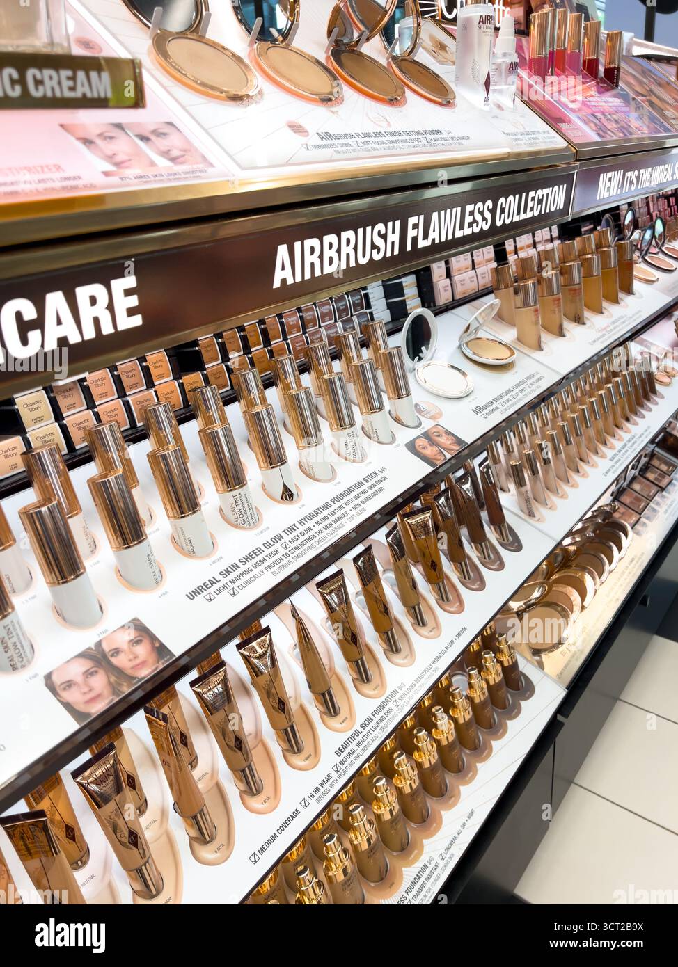 Makeup display with foundation and skincare products Stock Photo - Alamy