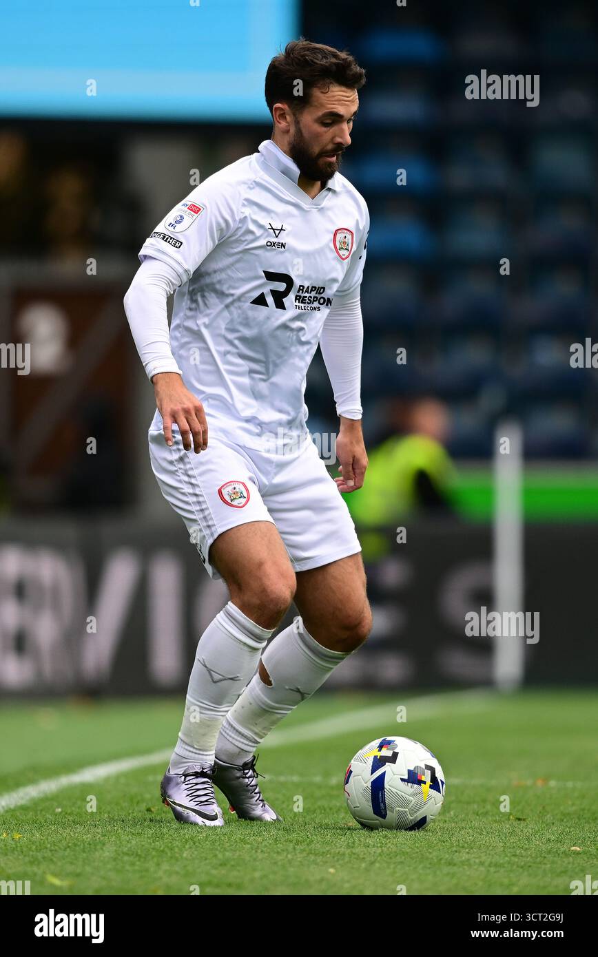 Barnsley's Adam Phillips dribbles with the ball in the match between ...