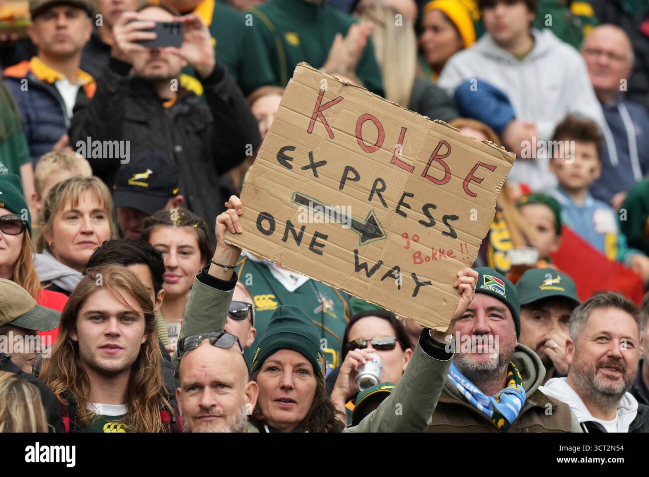 A fan holds a placard with South Africa's Cheslin Kolbe's name before ...