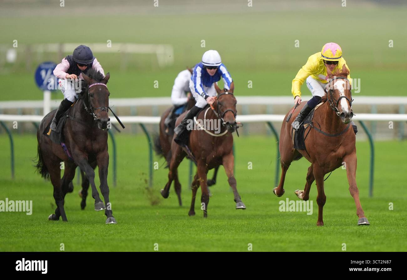Ray Dawson on Princess Rascal (right) going on to win the British EBF Premier Fillies' Handicap ...
