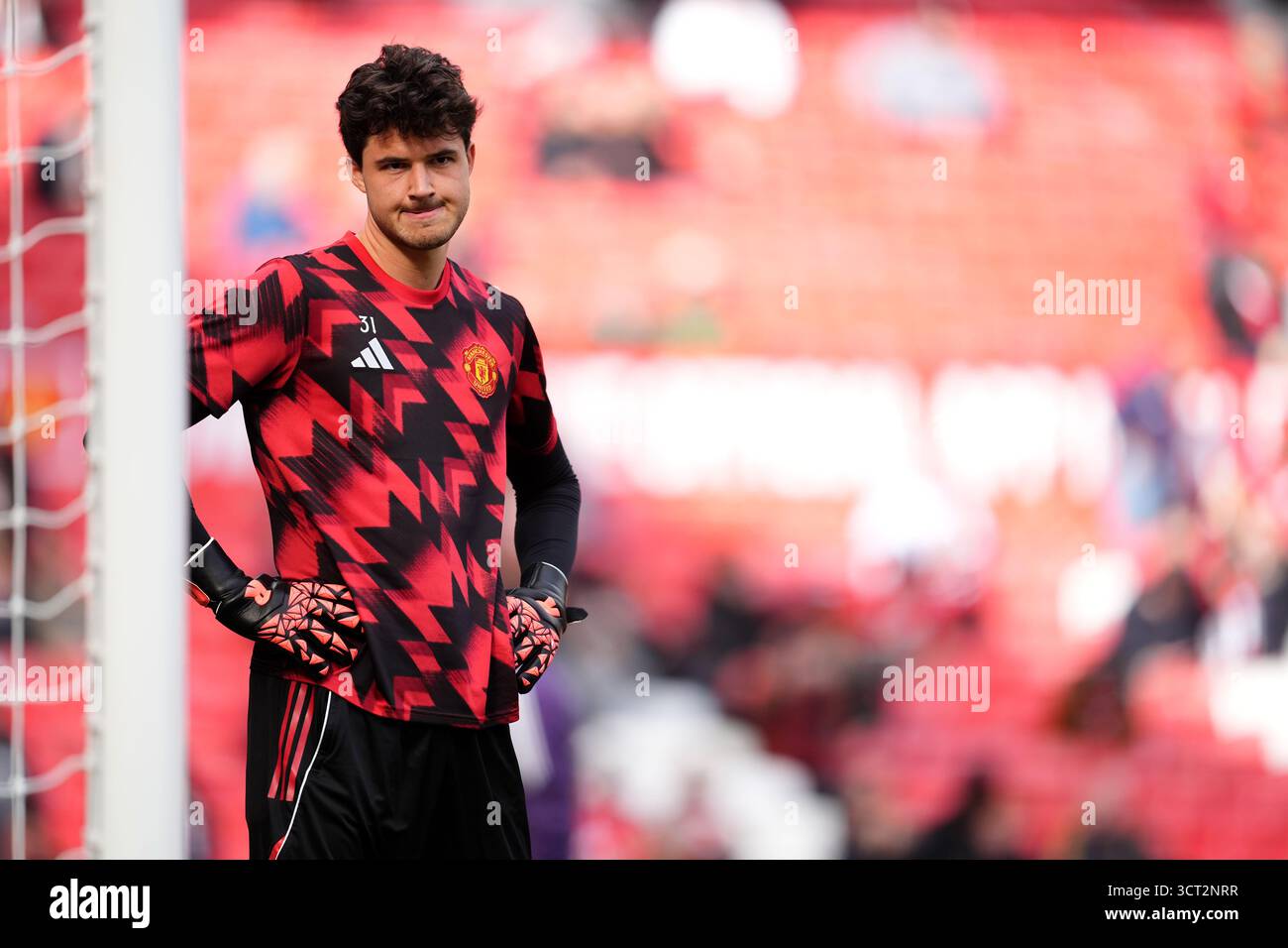 Manchester United goalkeeper Senne Lammens warming up before the ...