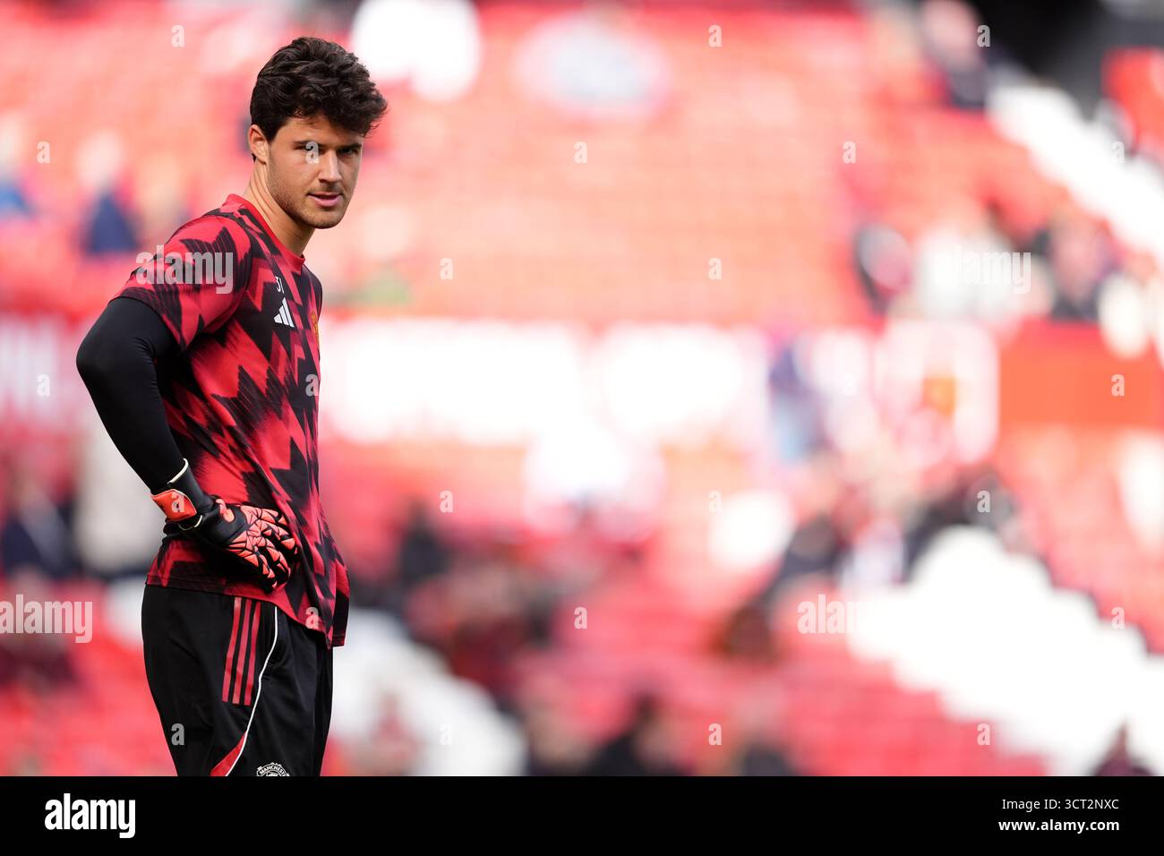 Manchester United goalkeeper Senne Lammens warming up before the ...