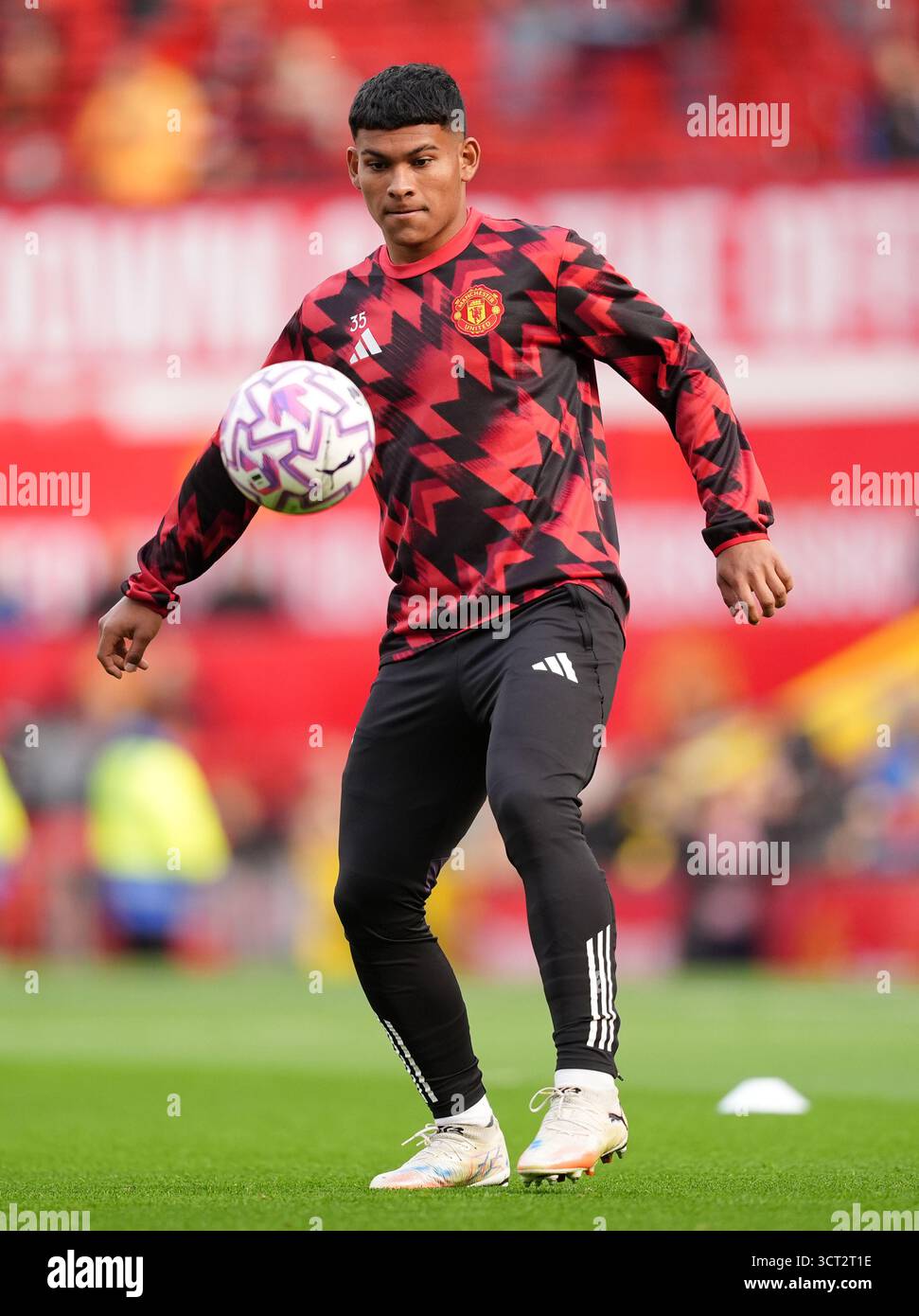 Manchester United's Diego Leon warms up before the Premier League match ...