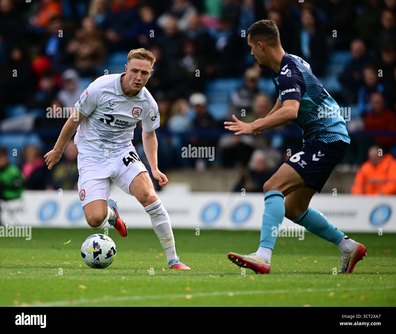 Barnsley's Davis Keillor-Dunn dribbles with the ball past Wycombe ...