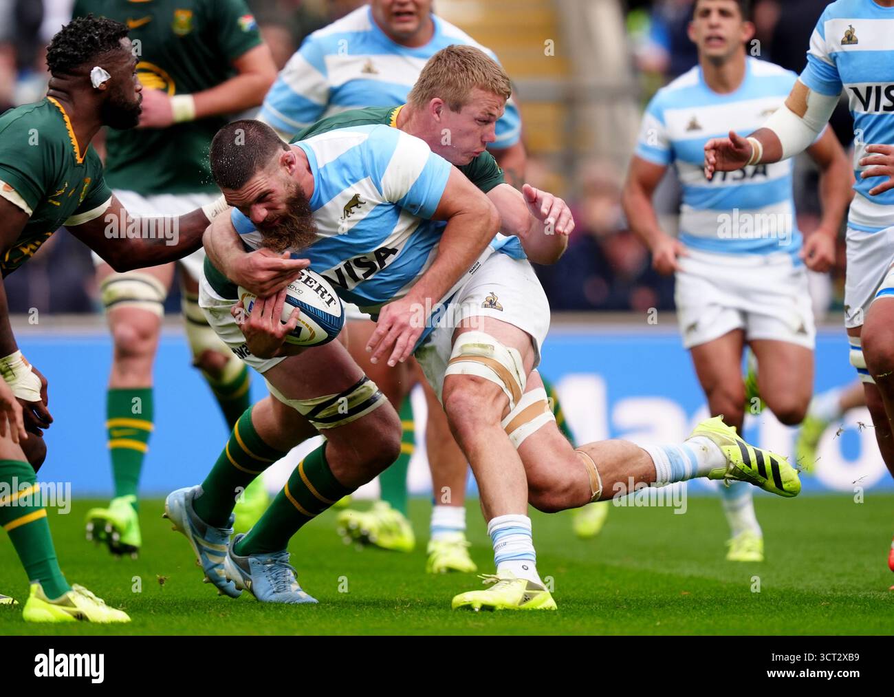 Argentina's Marcos Kremer (front) is tackled by South Africa's Pieter ...