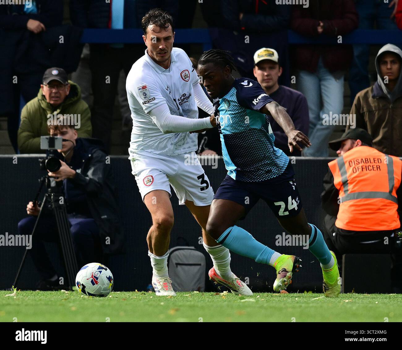 Barnsley's Josh Earl battles for the ball against Wycombe Wanderers ...