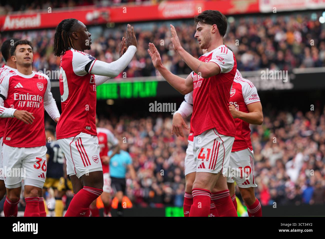 Arsenal's Declan Rice, centre right, celebrates with teammates after ...
