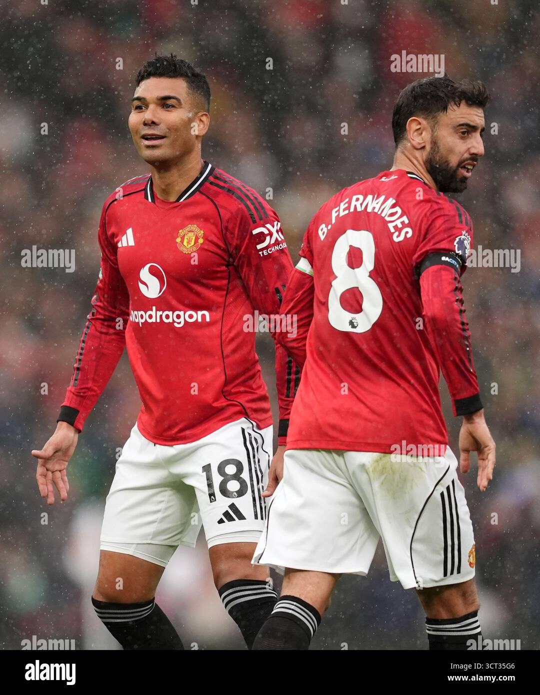 Manchester United's Casemiro and Bruno Fernandes during the Premier ...