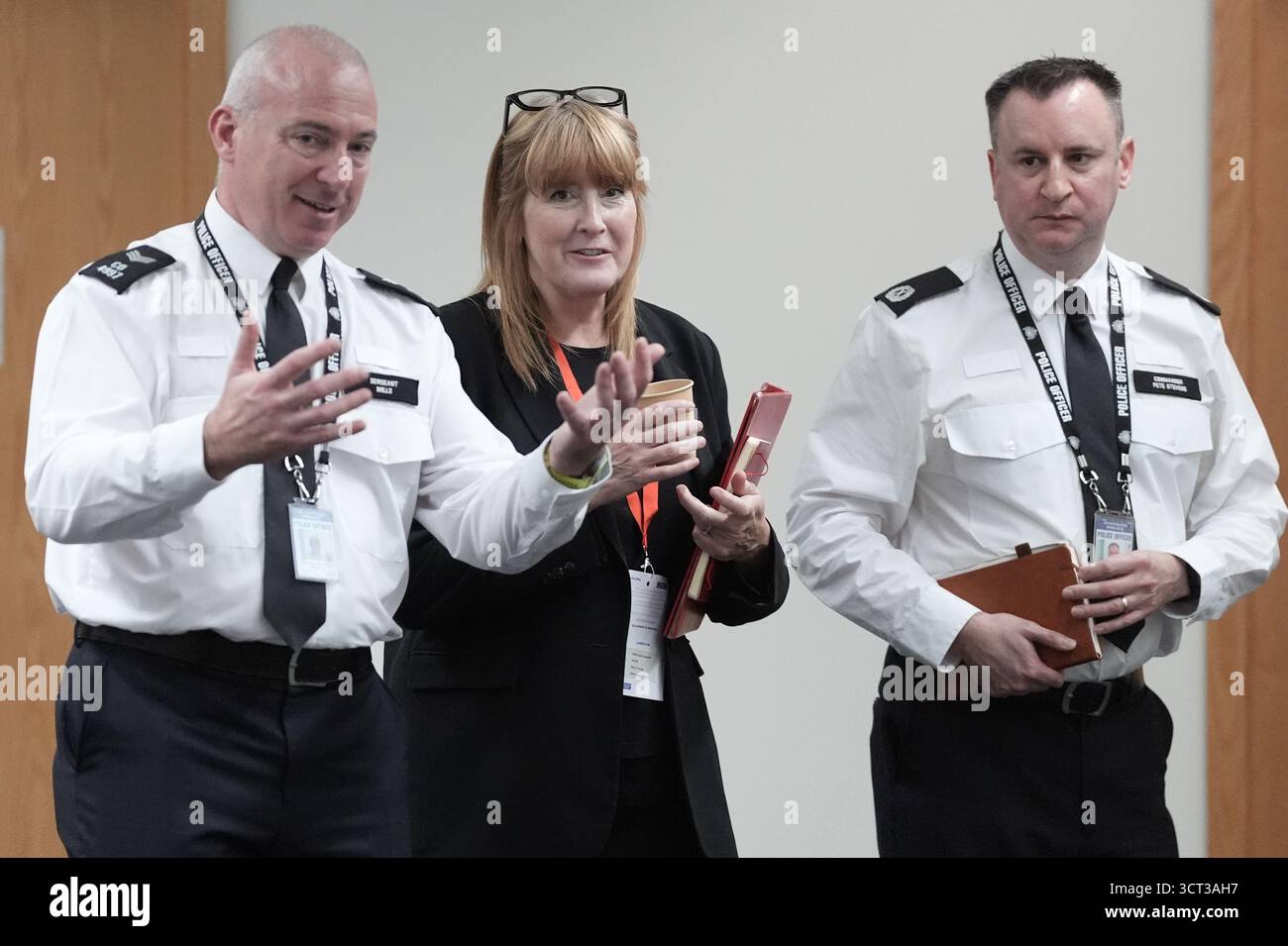 Policing Minister Sarah Jones with Sergeant Freddie Mills (left) and ...