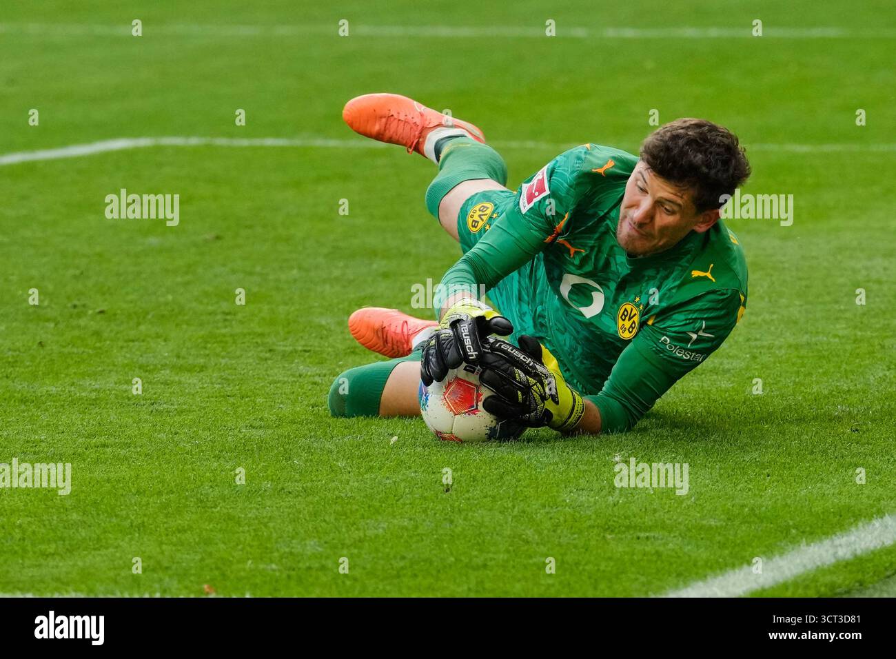 Dortmund's goalkeeper Gregor Kobel saves the ball during the German ...