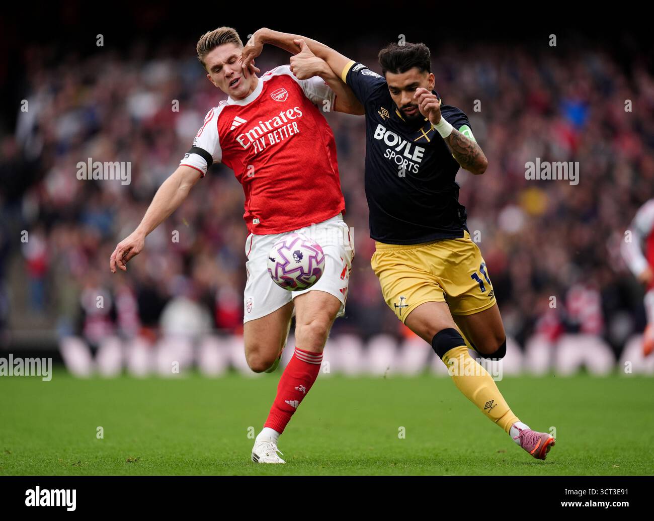 Arsenal's Viktor Gyokeres (left) and West Ham United's Lucas Paqueta ...