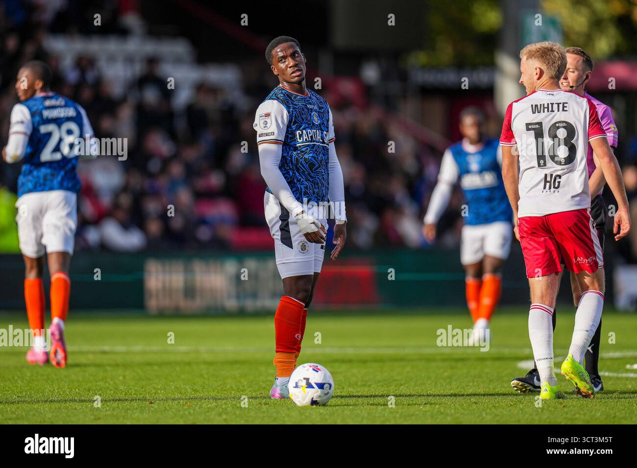 Stevenage, UK. 04th Oct, 2025. Joseph Gbode (31) of Luton Town (centre ...
