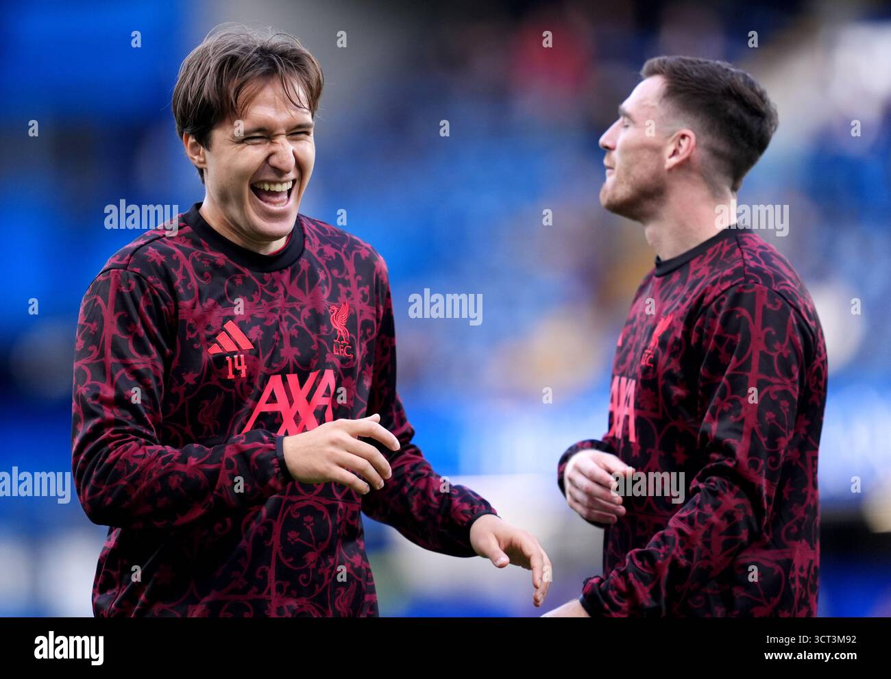 Liverpool's Federico Chiesa (left) and Andrew Robertson during the warm ...