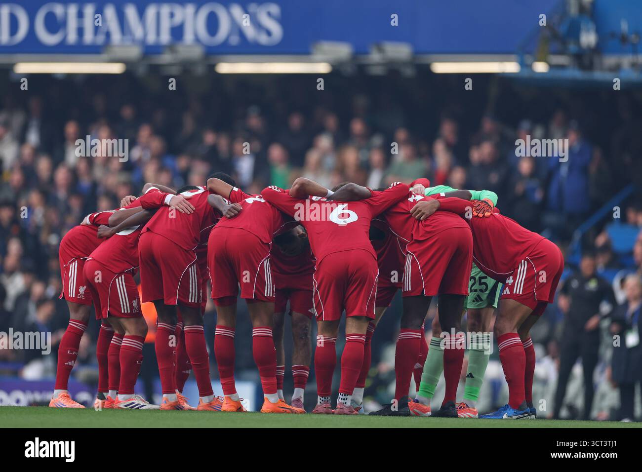 Liverpool players huddle before the English Premier League soccer match ...