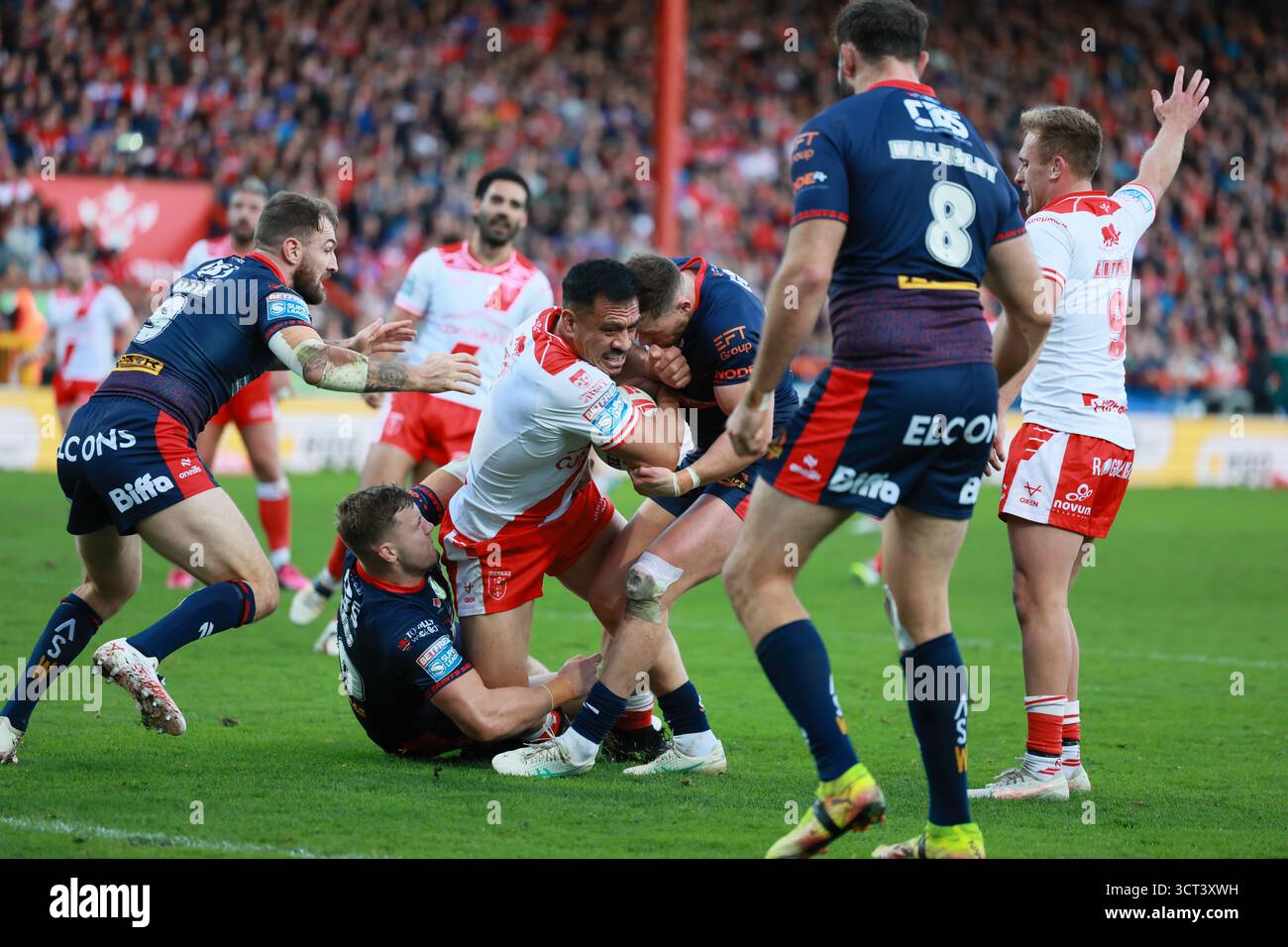 Hull KR's Elliot Minchella takes on the St Helens defence during the ...