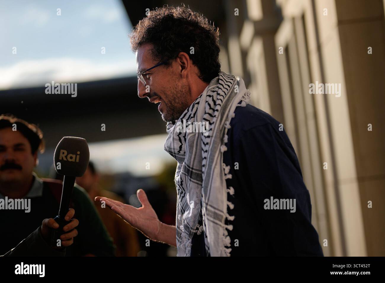 Lorenzo D'Agostino, of Italy, speaks to the media after arriving in ...