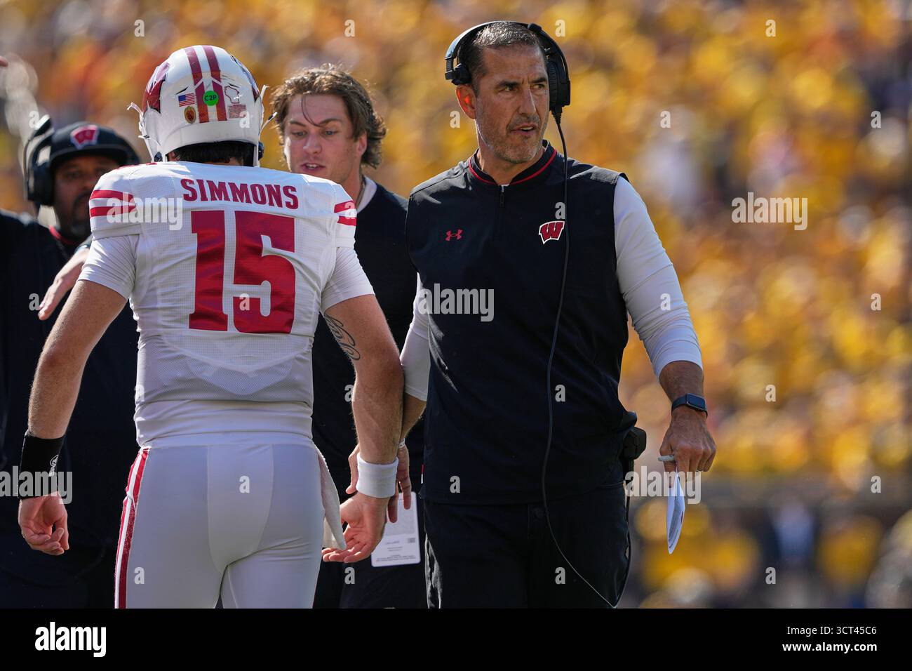 Wisconsin head coach Luke Fickell, right, greets quarterback Hunter ...