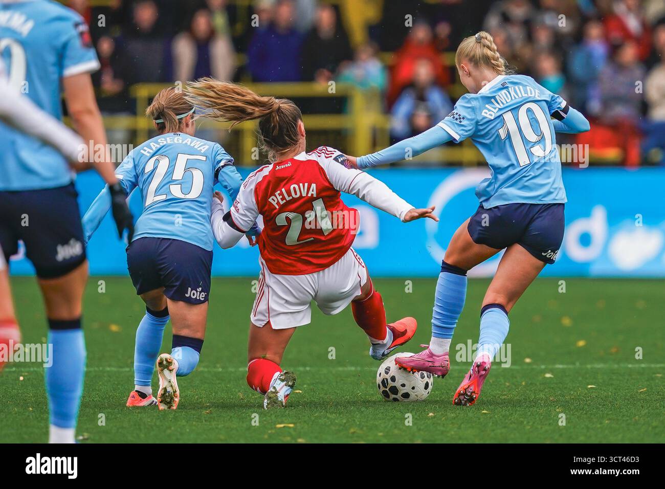 MANCHESTER, ENGLAND - October 4: Victoria Pelova of Arsenal FC puts her ...