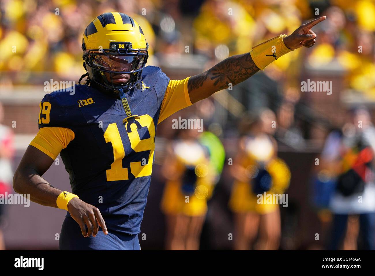 Michigan quarterback Bryce Underwood gestures after a defensive penalty during the first half of ...