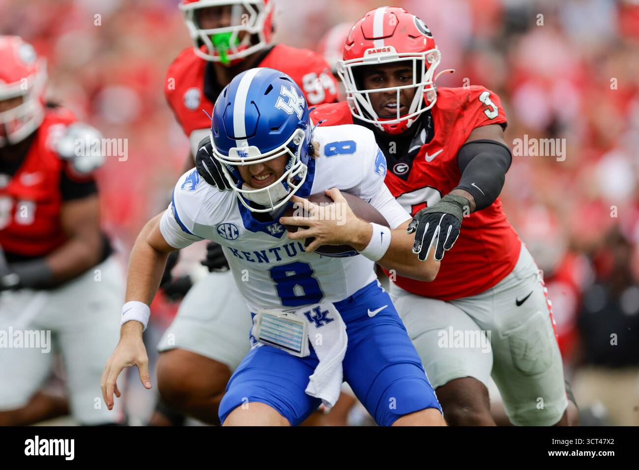 Kentucky quarterback Cutter Boley (8) is sacked by Georgia inside ...