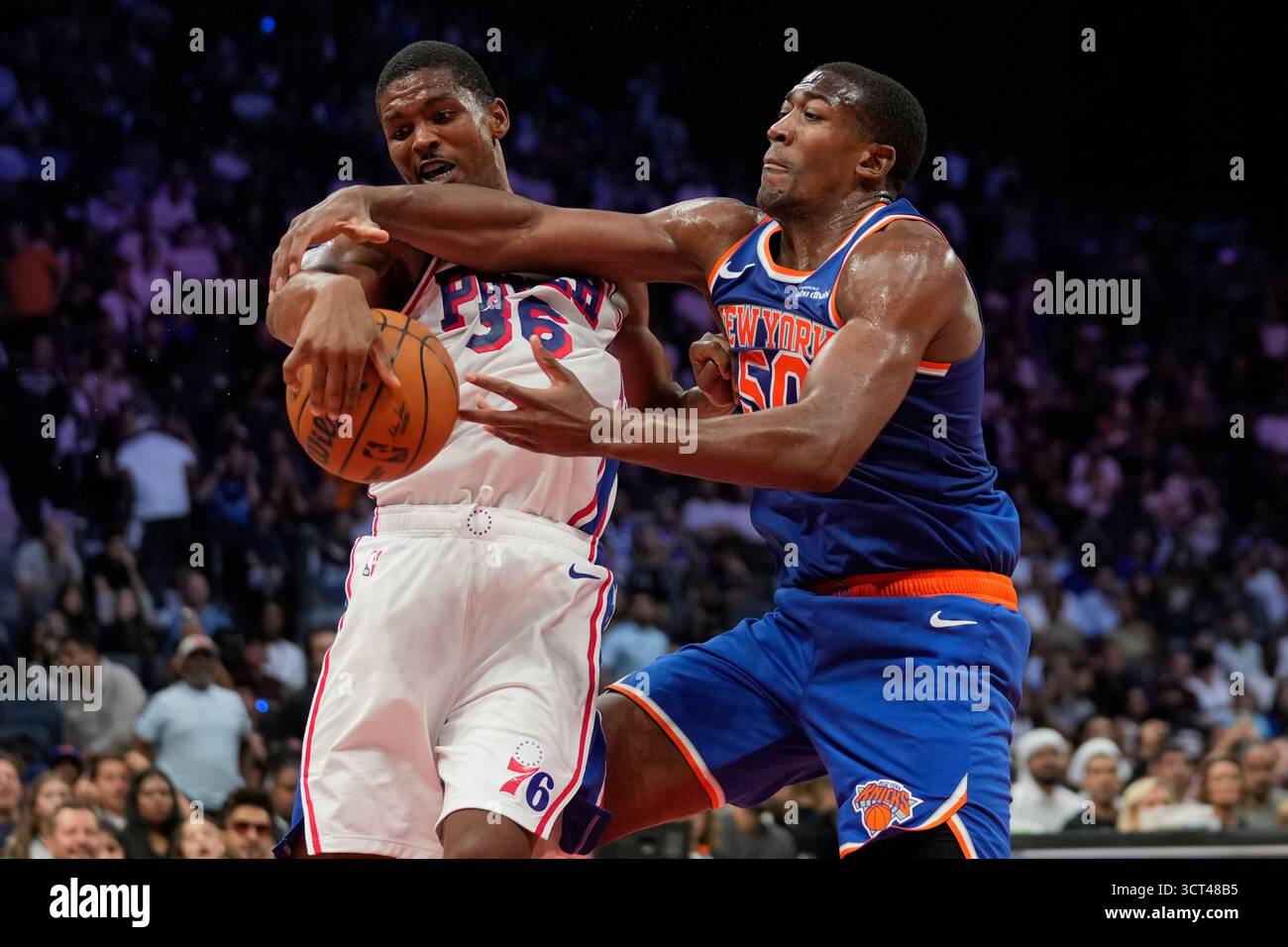 Philadelphia 76ers guard Malcolm Hill (36) battles New York Knicks forward Trey Jemison III (50 ...
