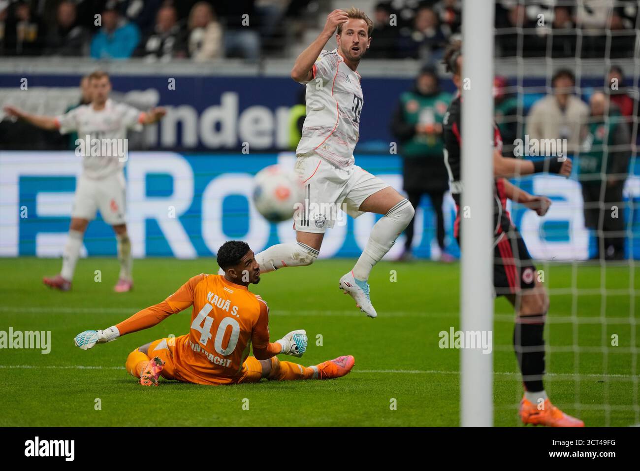 Bayern's Harry Kane tries to score behind Frankfurt's goalkeeper Kaua ...