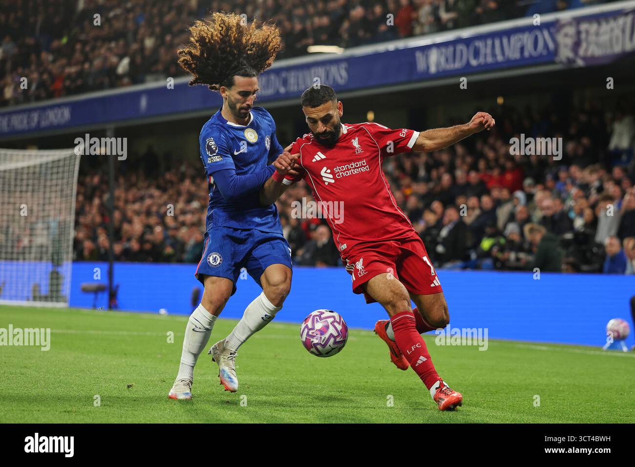 Chelsea's Marc Cucurella, left, challenges Liverpool's Mohamed Salah ...