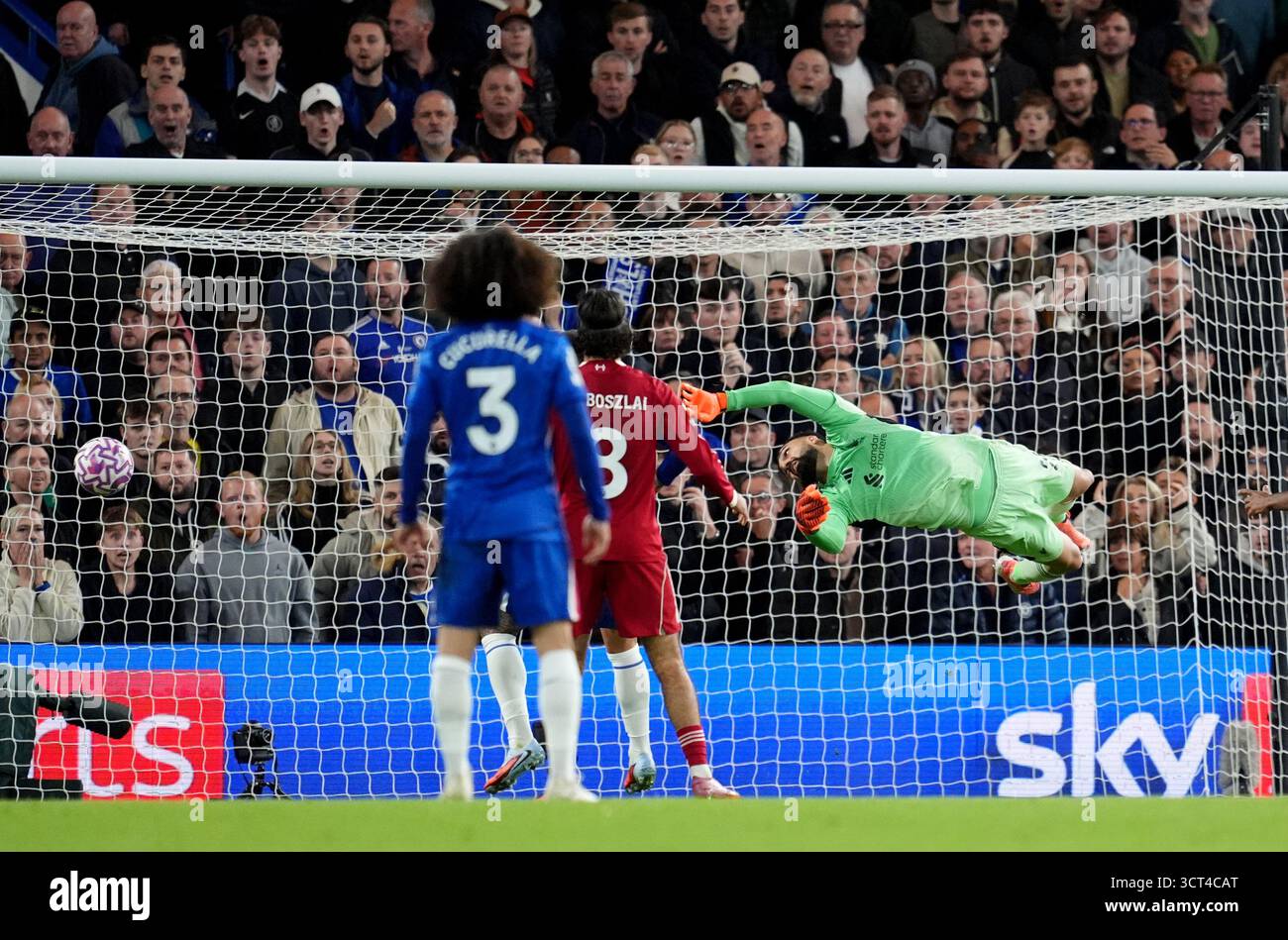Liverpool goalkeeper Giorgi Mamardashvili (right) makes a save during ...