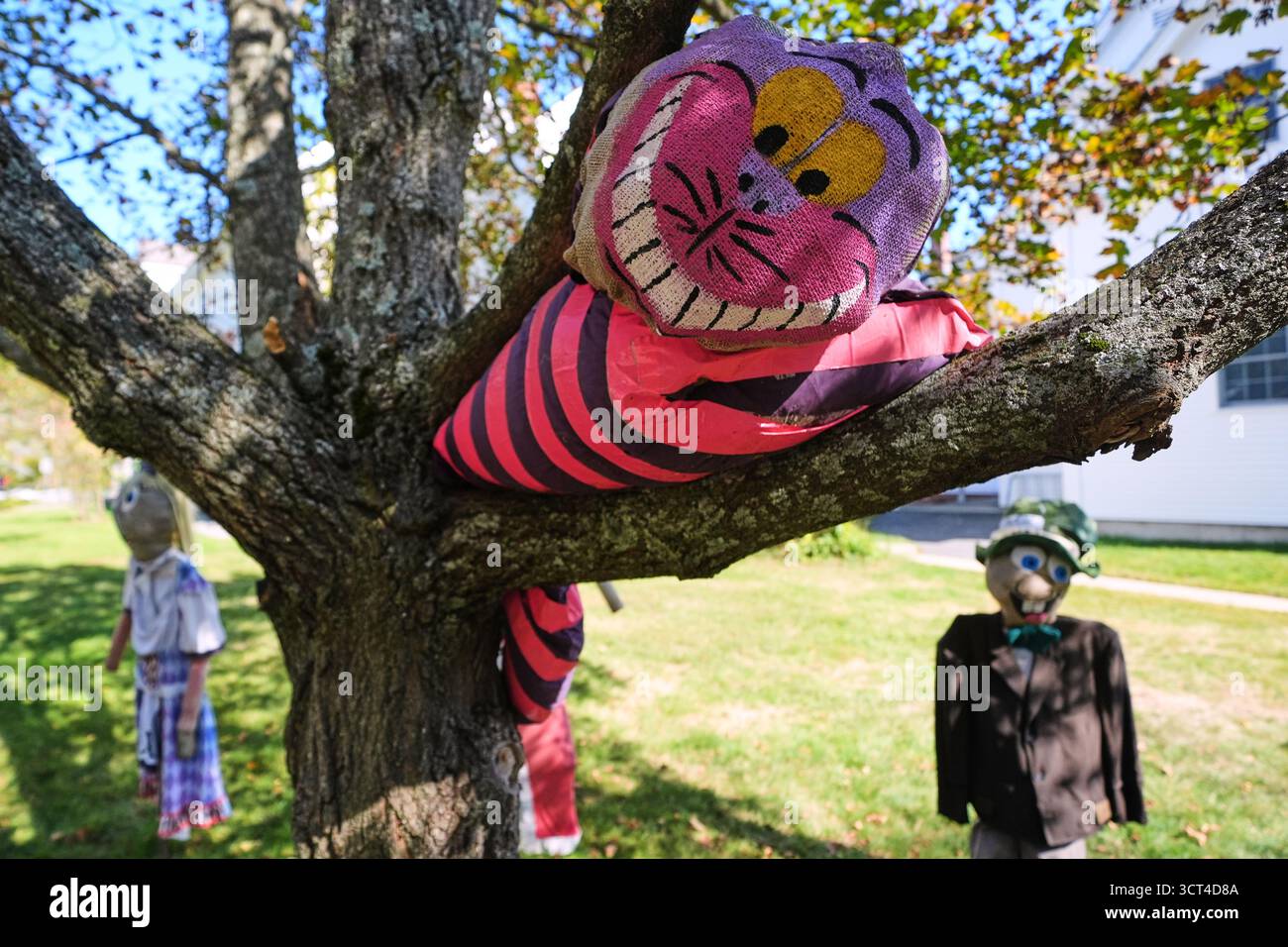 A Cheshire Cat scarecrow, one of the hundreds on display, is seen in ...