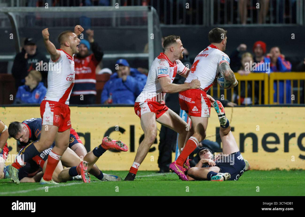Hull KR's Oliver Gildart (right) scores his team's fourth try during ...