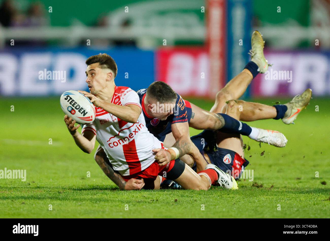 Hull KR's Arthur Mourgue is tackled during the Grand Final Semi Final ...