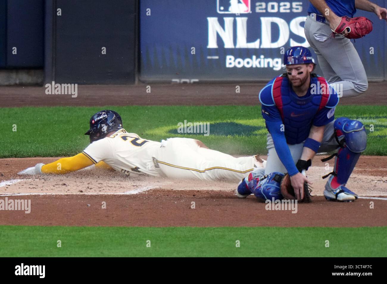 Milwaukee Brewers' William Contreras scores past Chicago Cubs catcher ...