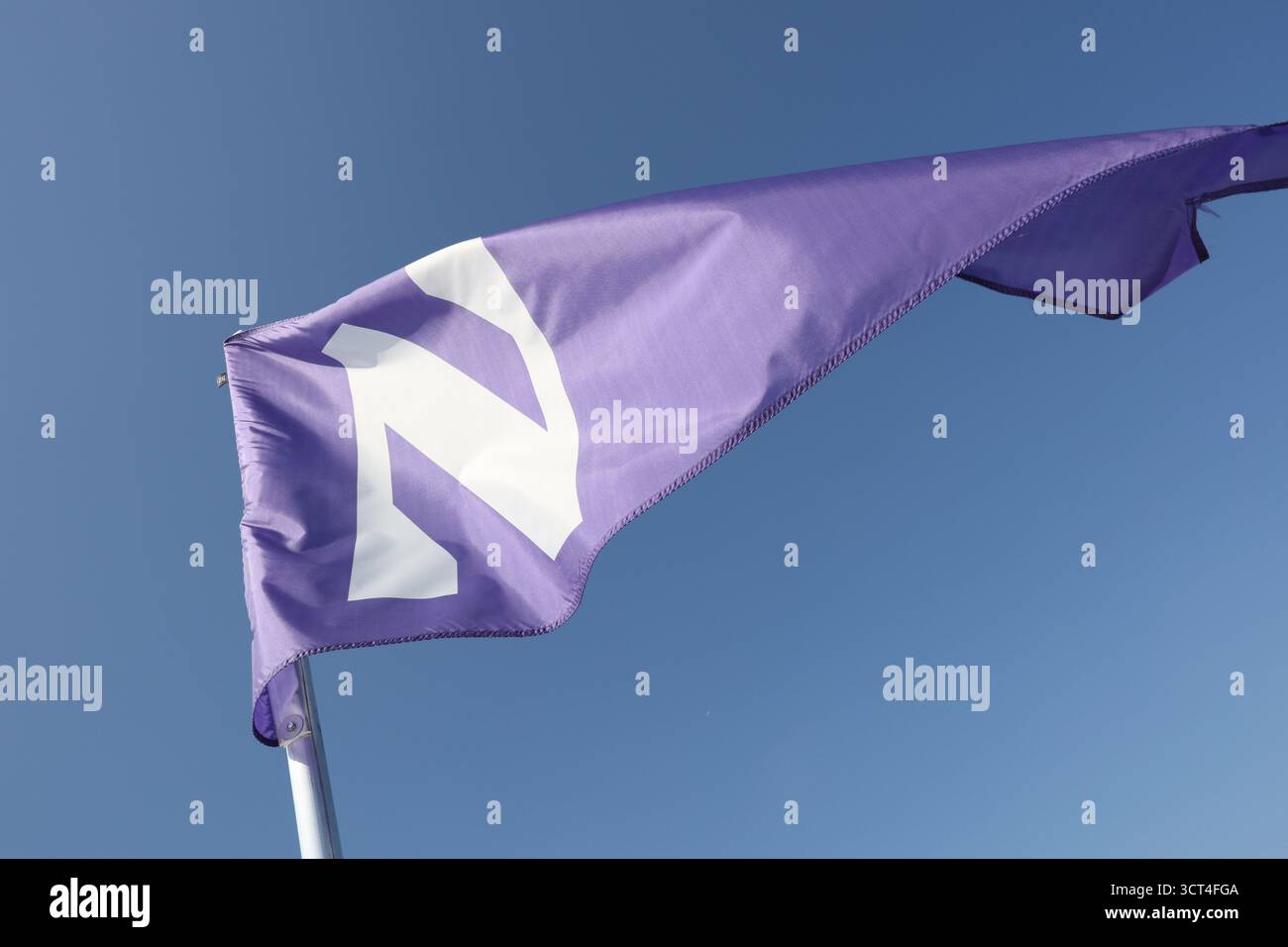 EVANSTON, ILLINOIS - OCTOBER 4: A purple Northwestern Wildcats flag ...