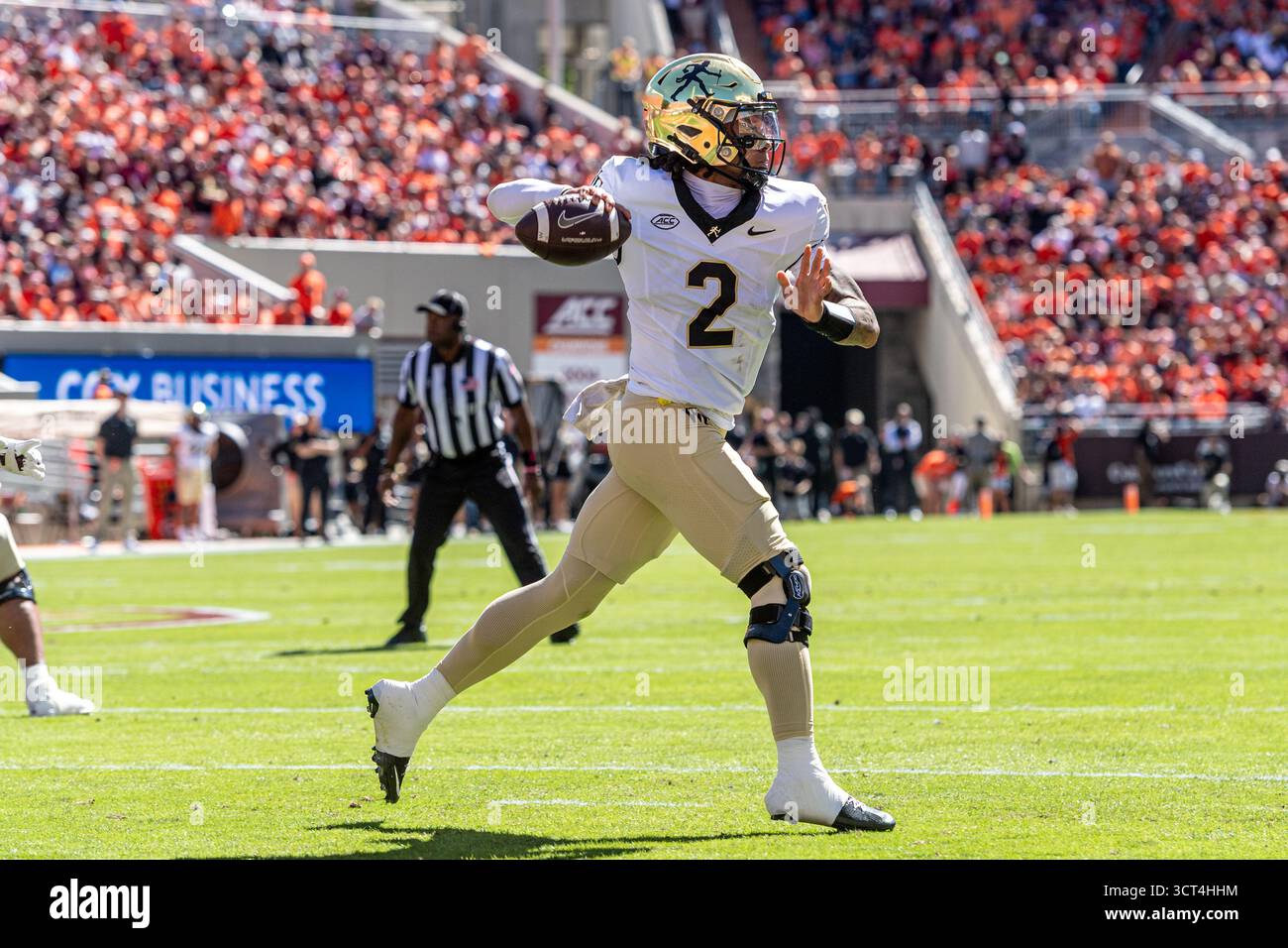 Wake Forest quarterback Robby Ashford (2) throws the ball downfield ...