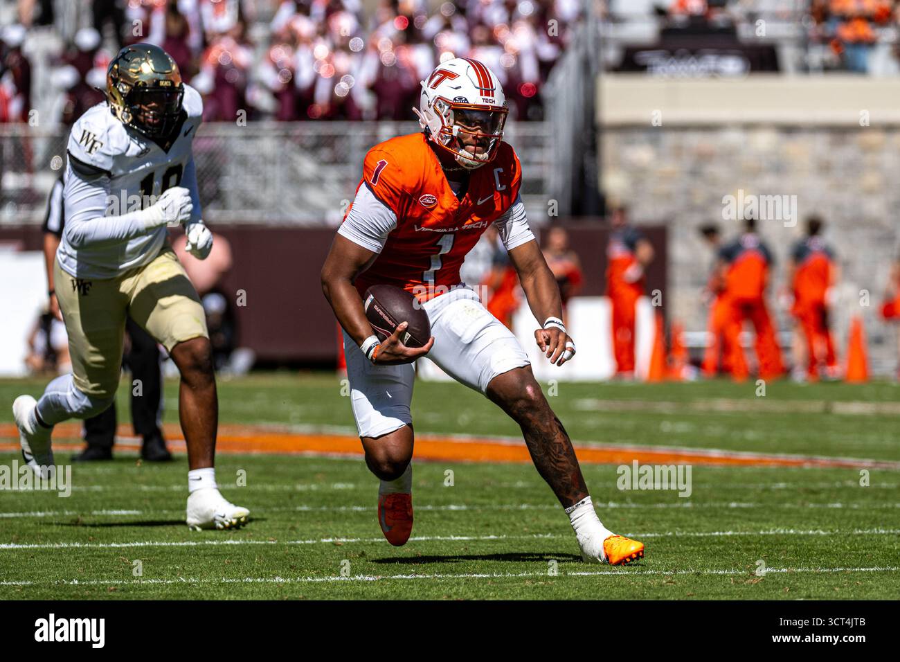 Virginia Tech quarterback Kyron Drones (1) runs the ball against Wake Forest during the first ...