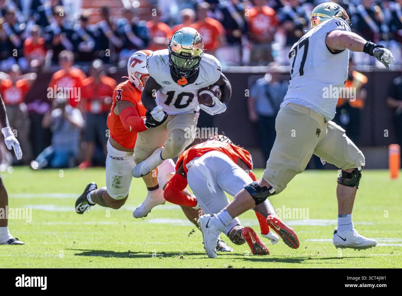 Wake Forest wide receiver Chris Barnes (10) runs the ball downfield ...