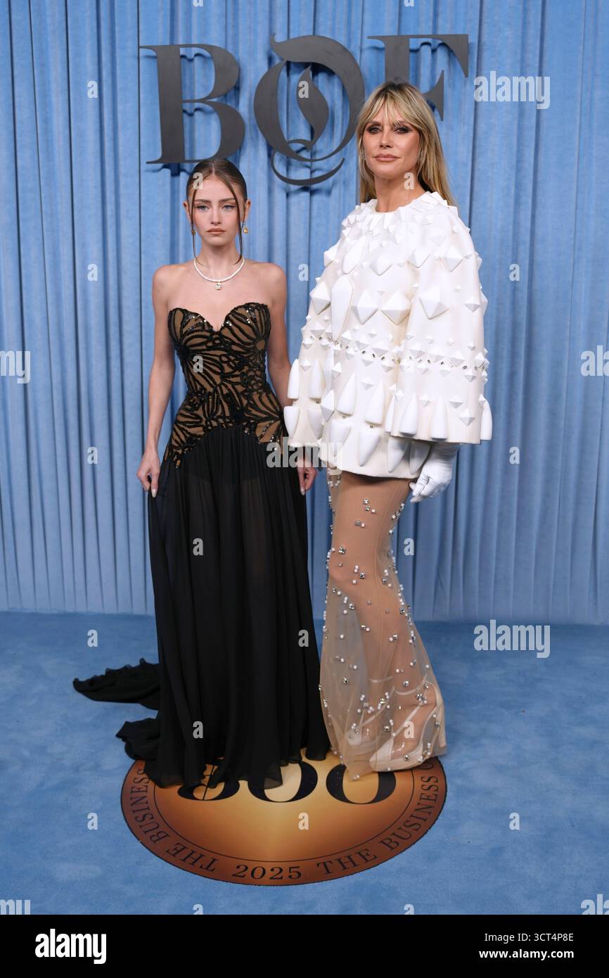 Leni Olumi Klum, left, and Heidi Klum pose for photographers upon ...