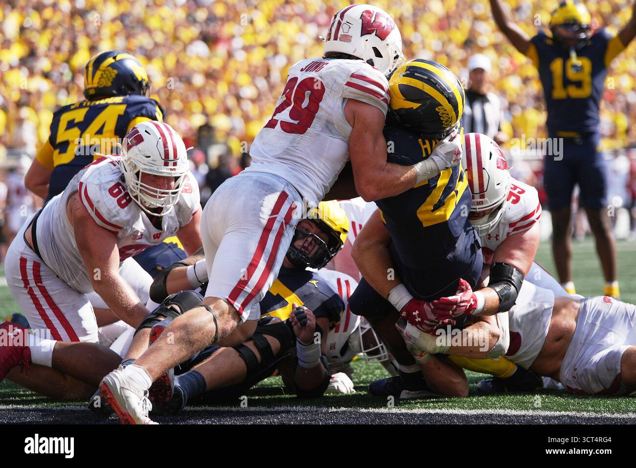 Michigan running back Justice Haynes (22) scores a touchdown past ...