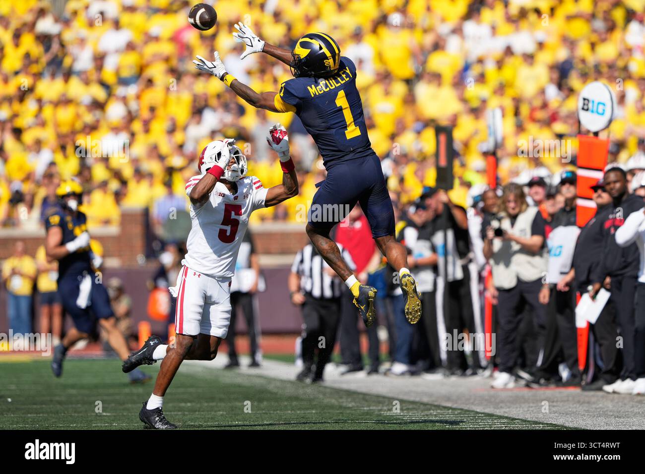 Michigan wide receiver Donaven McCulley, right, catches a pass against ...