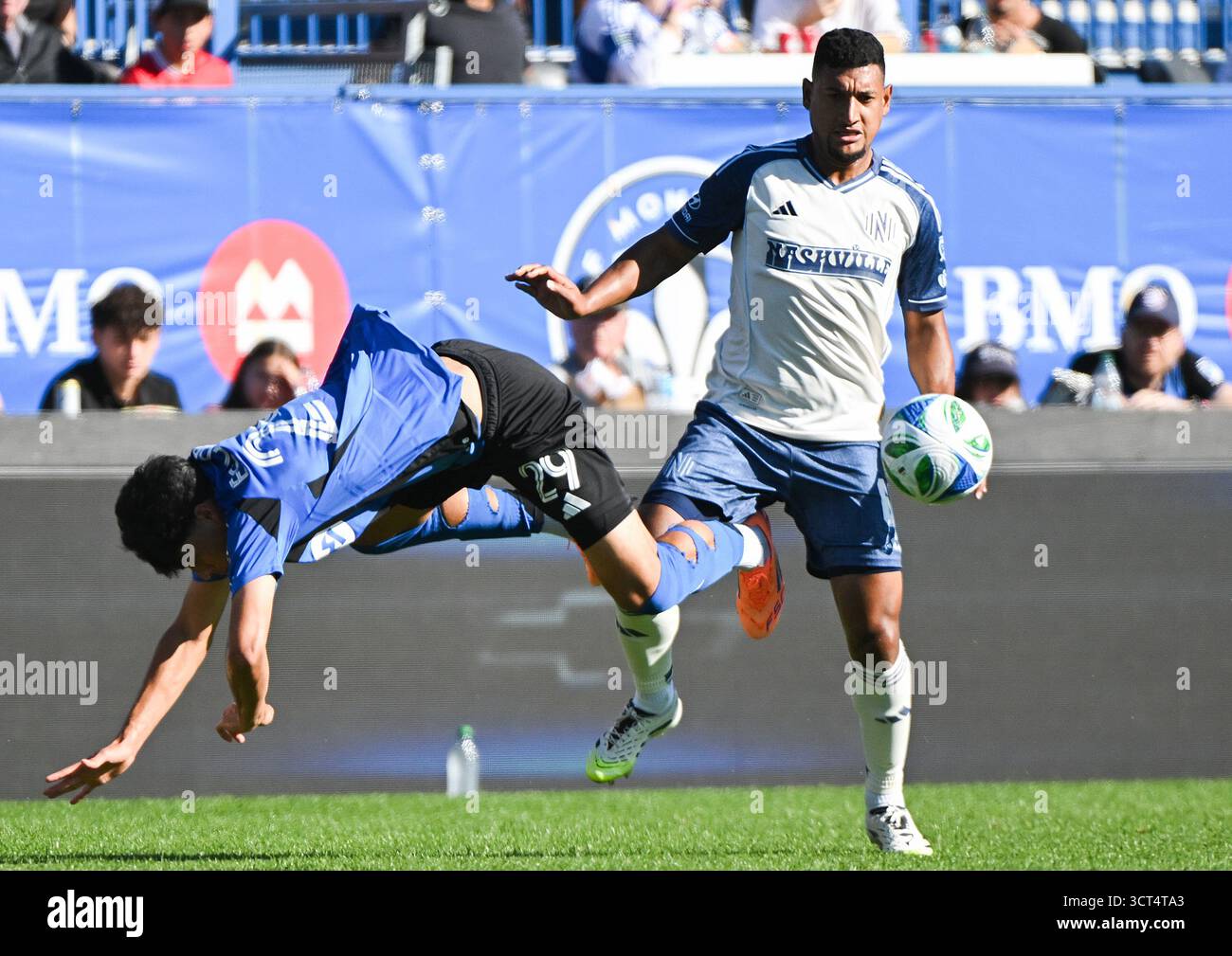 Nashville SC's Bryan Acosta, right, knocks CF Montreal's Olger Escobar ...