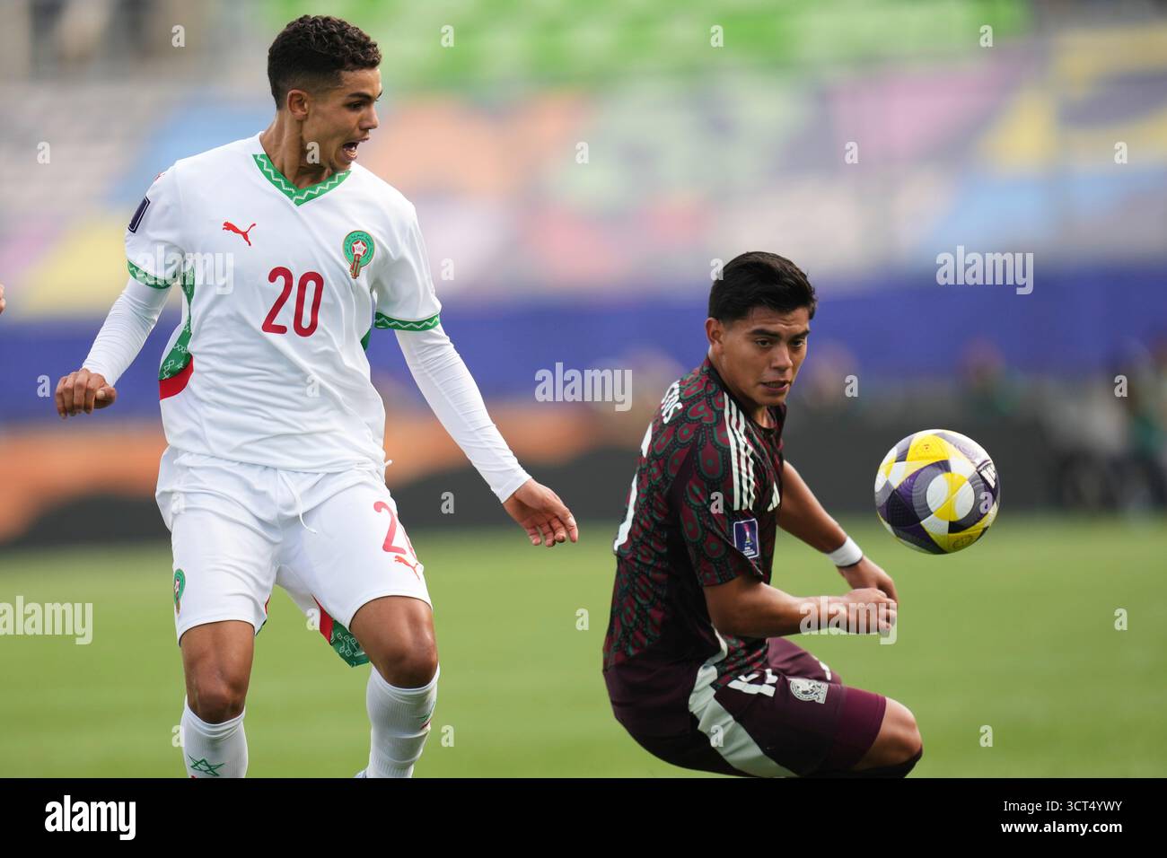 Mexico's Cesar Bustos, right, and Morocco's Mohammed Kebdani battle for ...