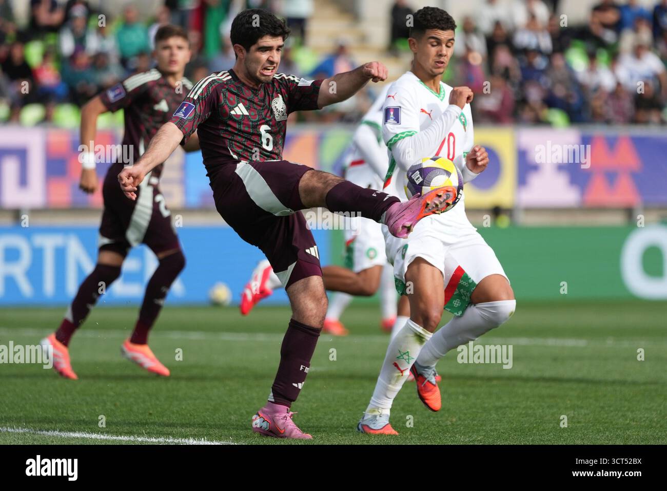 Mexico's Cesar Garza (6) and Morocco's Mohammed Kebdani battle for the ...